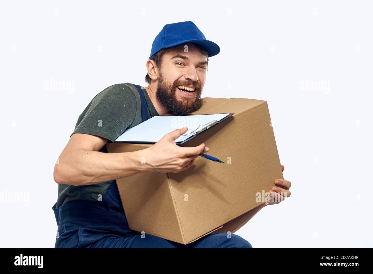 Working male courier with box in hand documents delivery service light ...