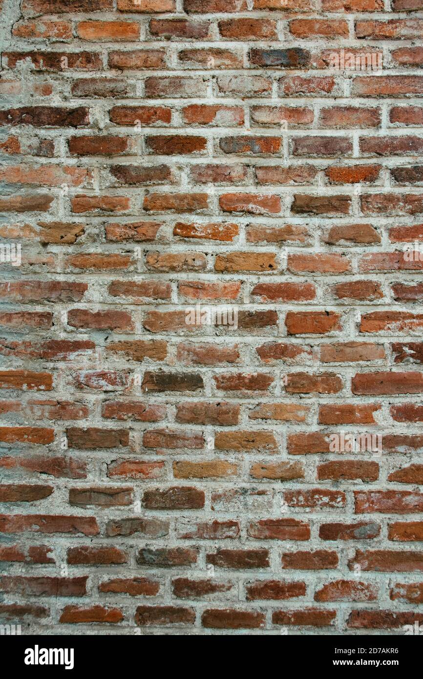 Vertical shot of the brickwork on a wall Stock Photo - Alamy