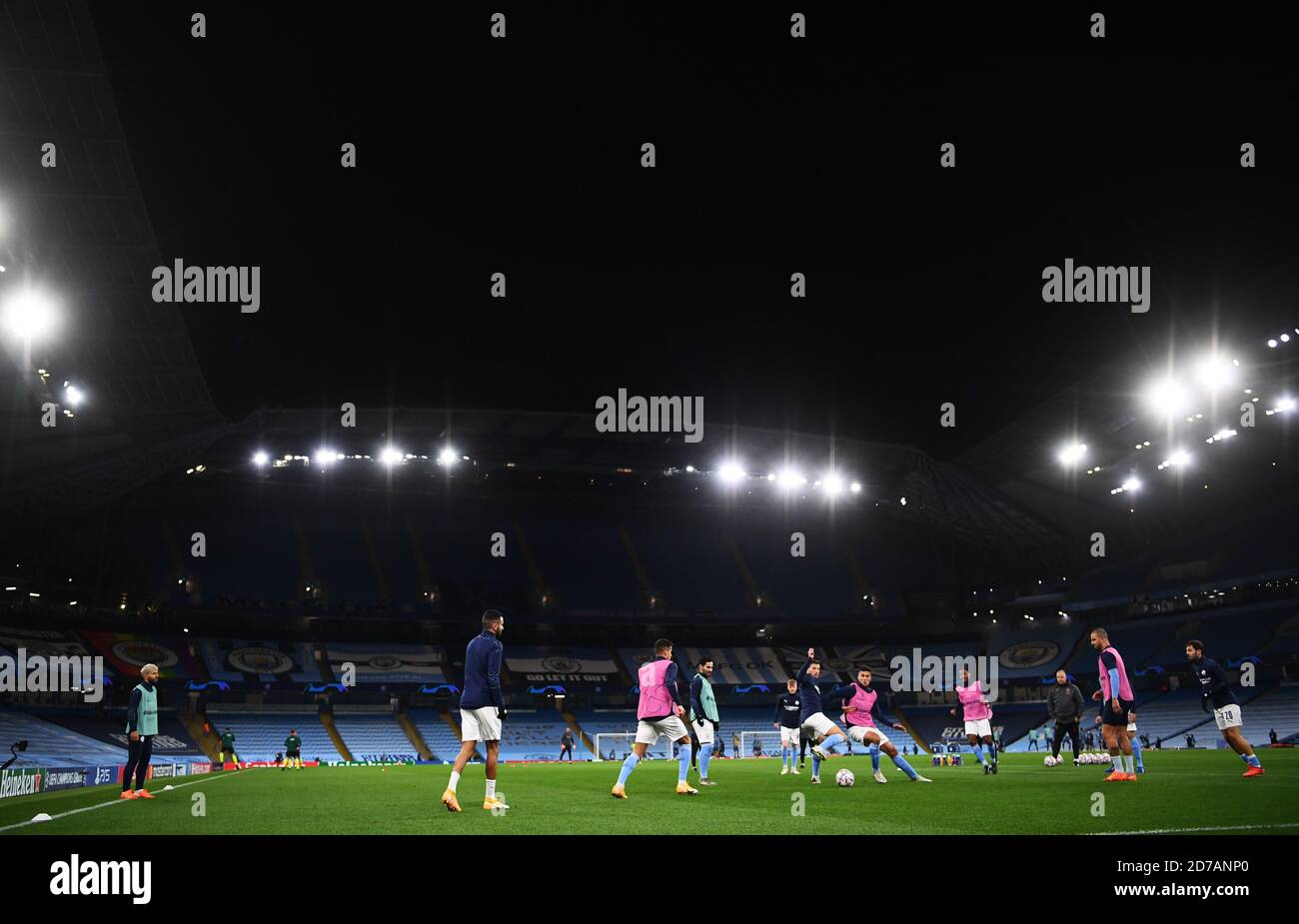 Manchester City players warm up before the UEFA Champions League Group C match at the Etihad ...