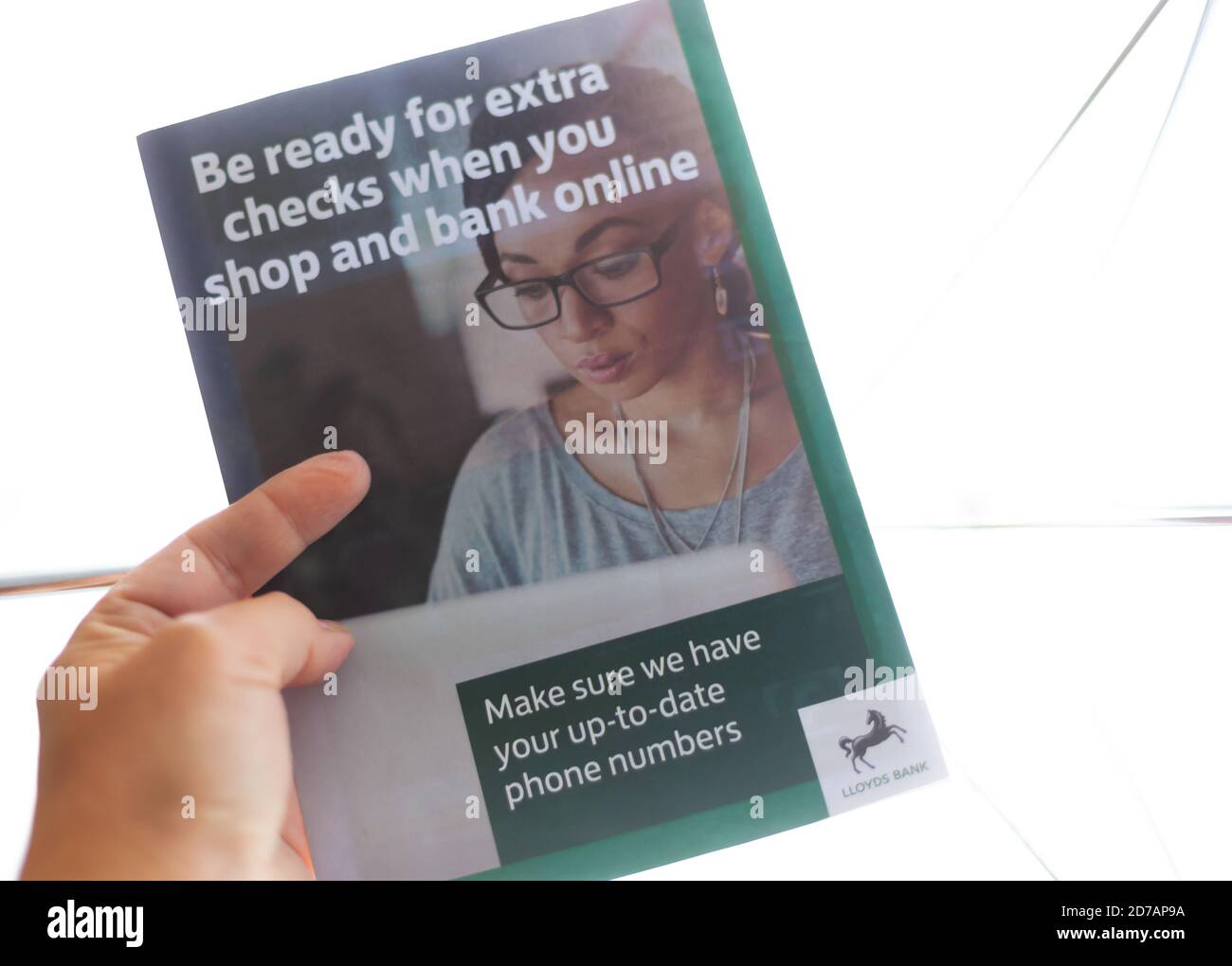 Hand holding pamphlet hi-res stock photography and images - Alamy