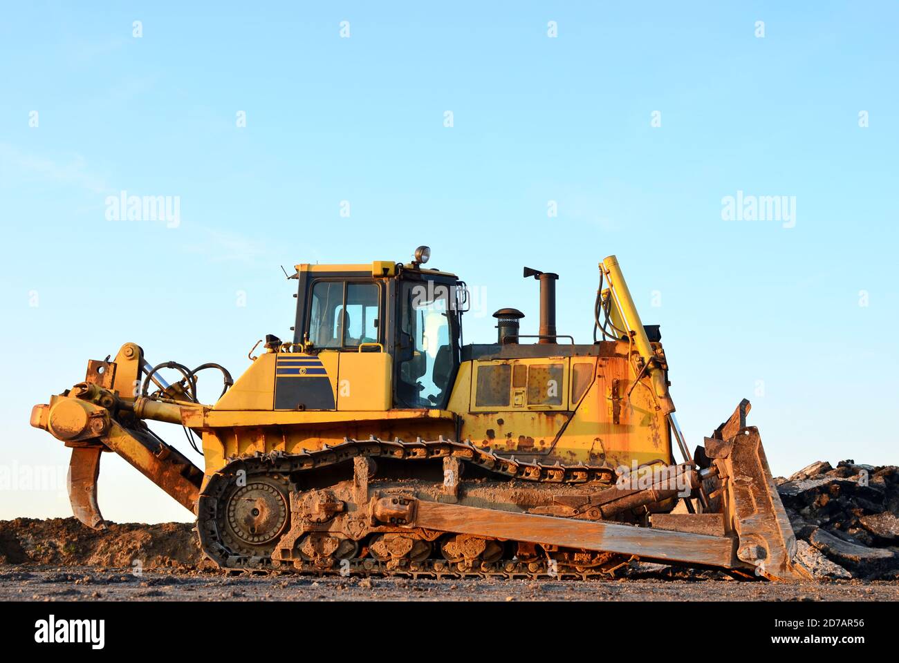Track-type bulldozer, earth-moving equipment. Land clearing, grading ...