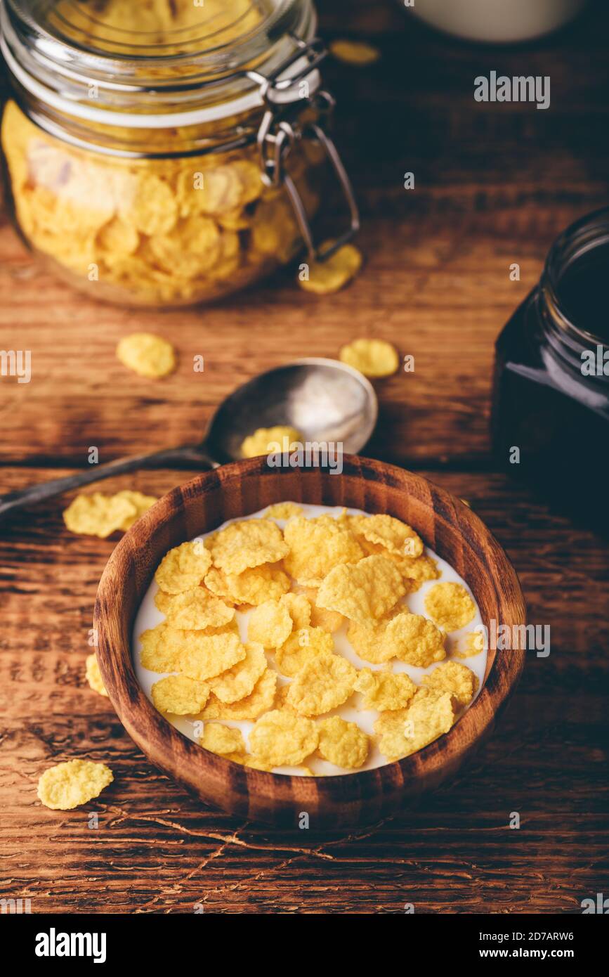 Breakfast with corn flakes, milk and jam Stock Photo - Alamy