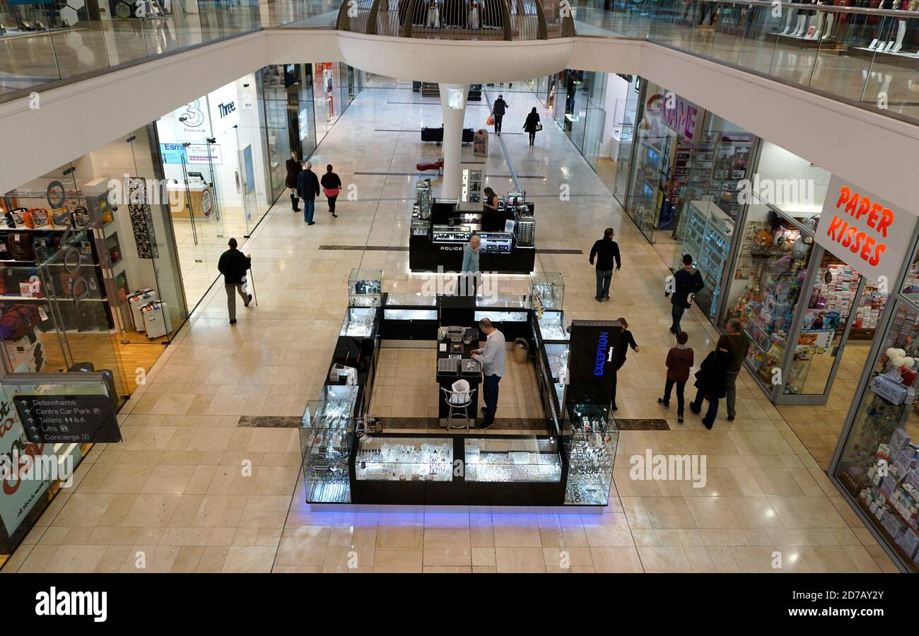 Modern indoor shopping center scene Stock Photo - Alamy
