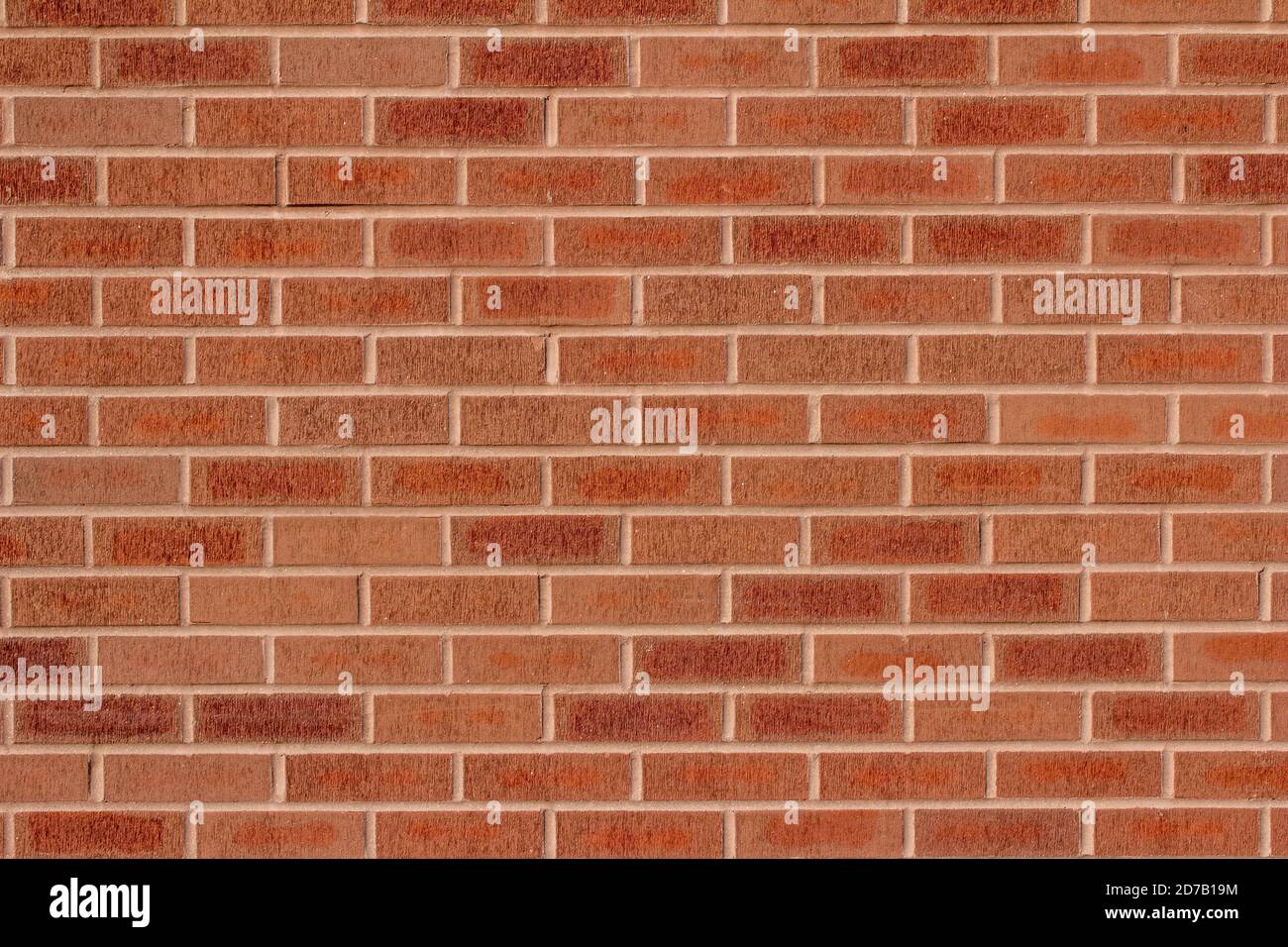 Full frame texture background of a modern red brick wall in traditional ...