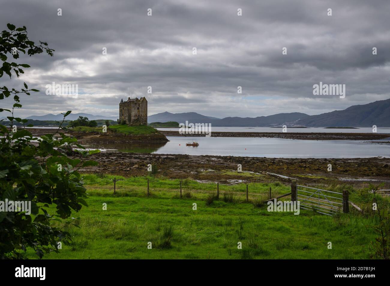 Stalker Castle on a tidal islet on Loch Laich, Argyll, Scotland, United ...