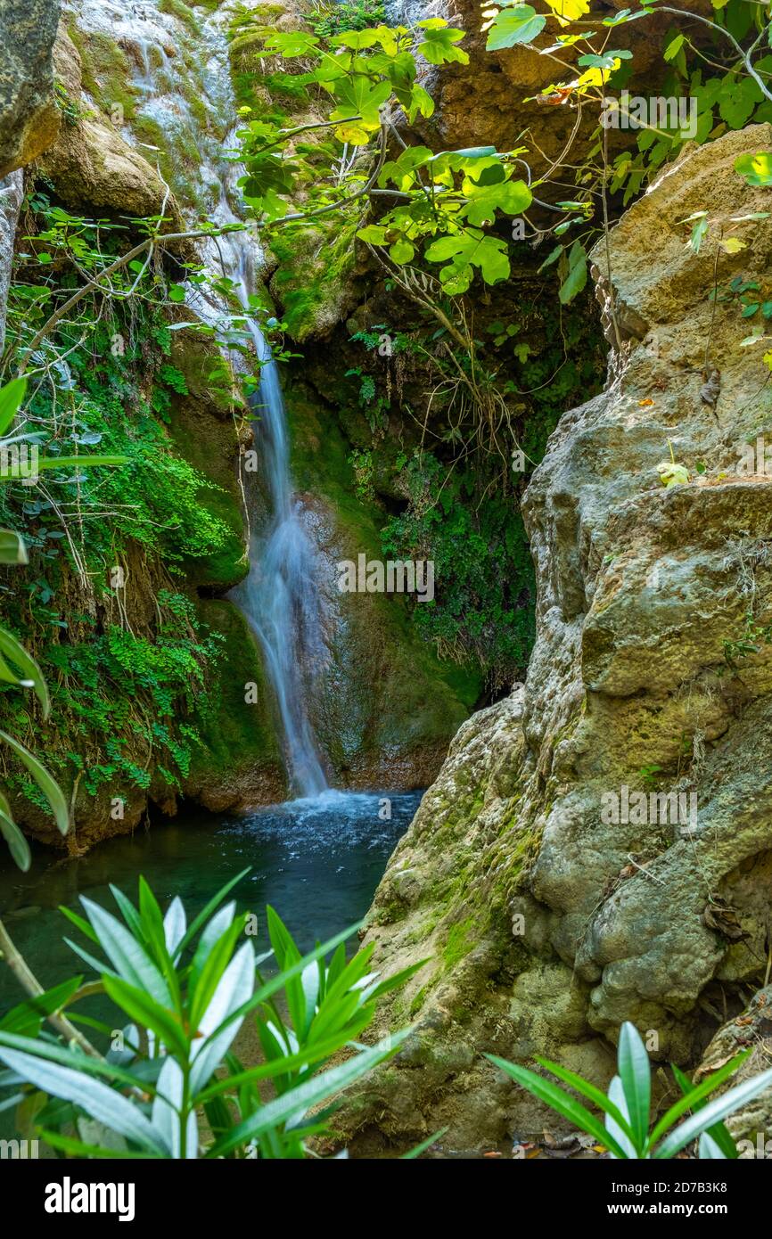 Small waterfall cascades rocky pool hi-res stock photography and images ...