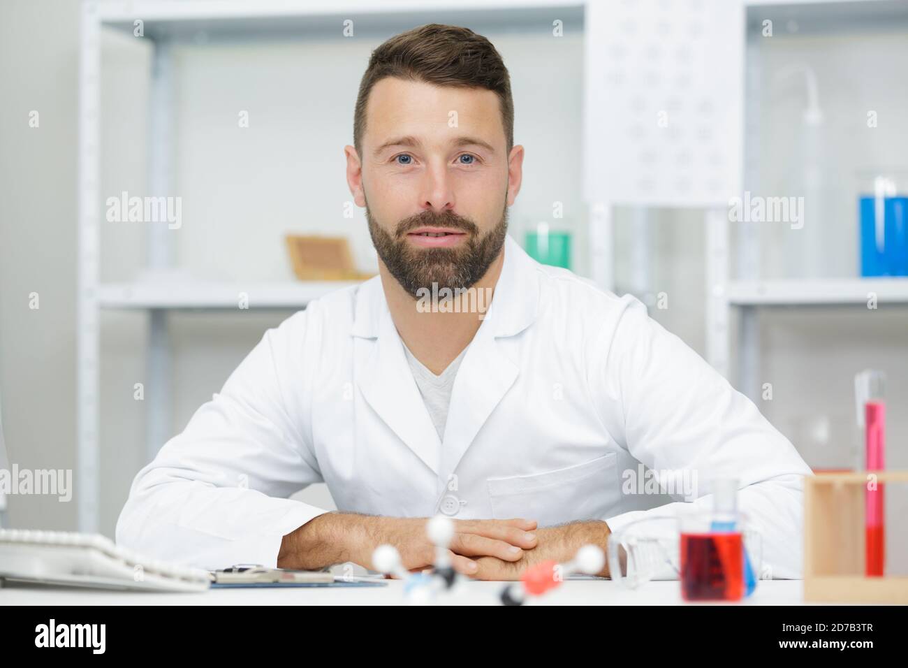 portrait of a scientist looking at camera Stock Photo - Alamy