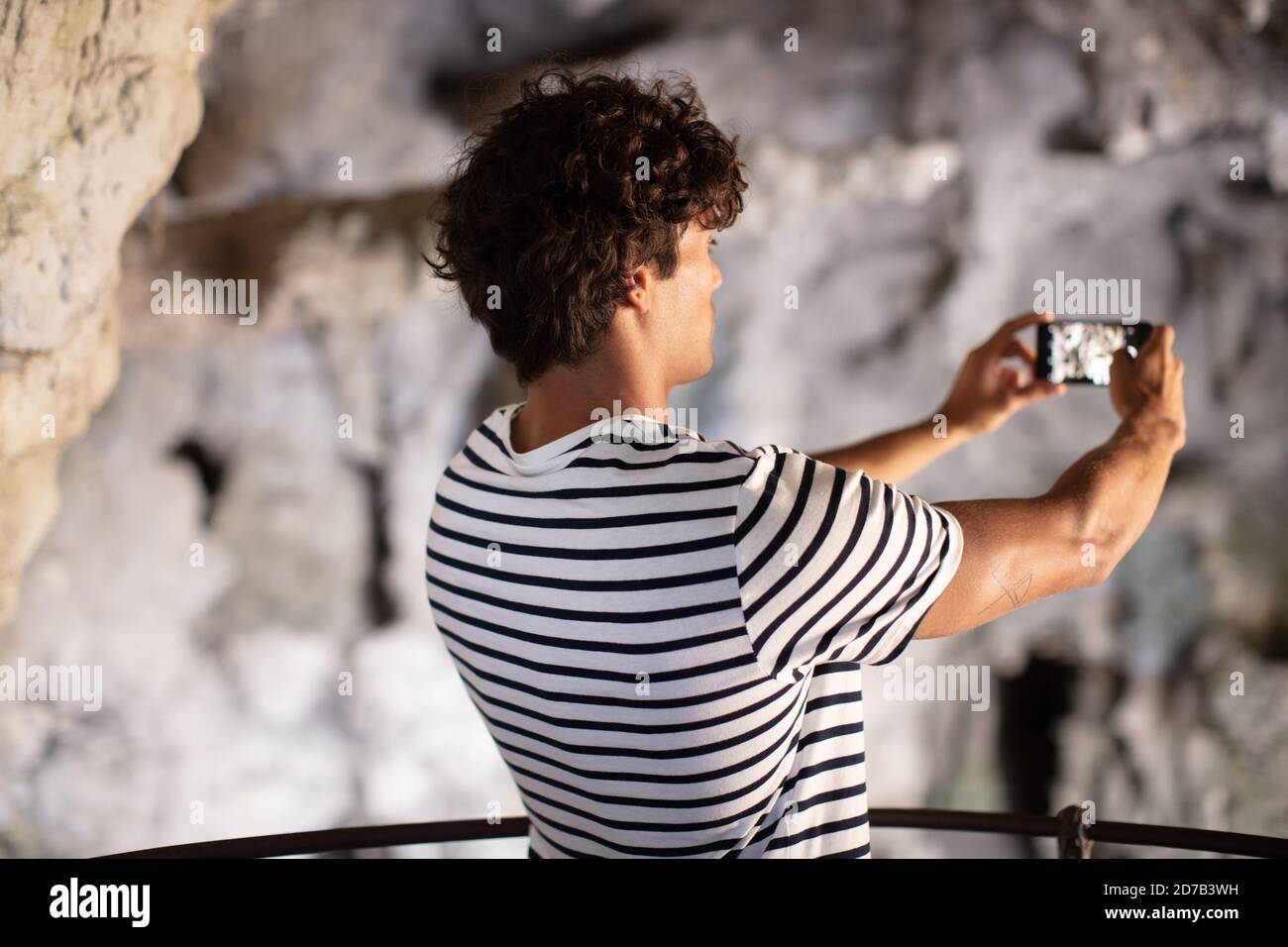 man taking a selfie in a natural cave Stock Photo - Alamy