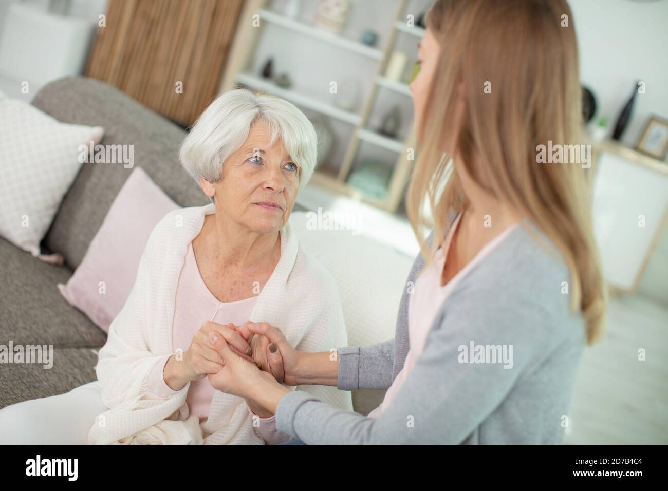 lady helping her old mother Stock Photo - Alamy