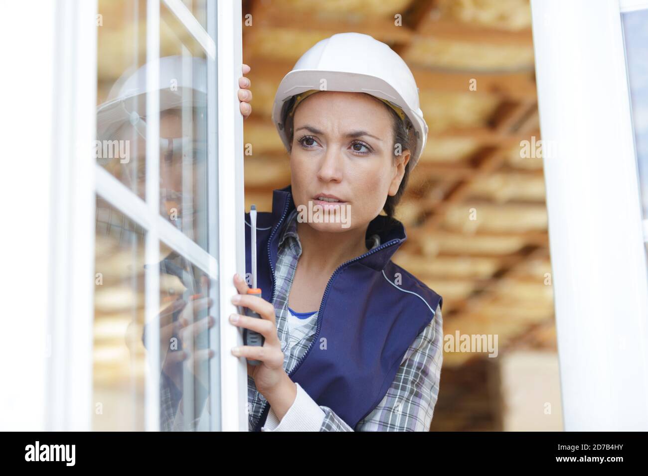 a female worker supervising window Stock Photo - Alamy