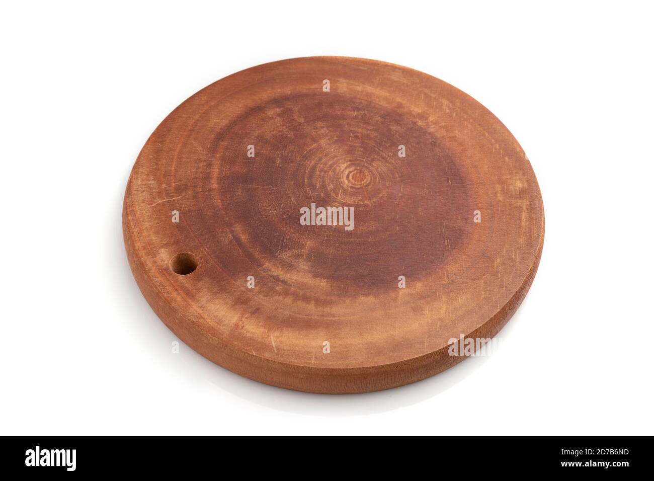 Wooden round cutting board isolated on white background. Side view ...