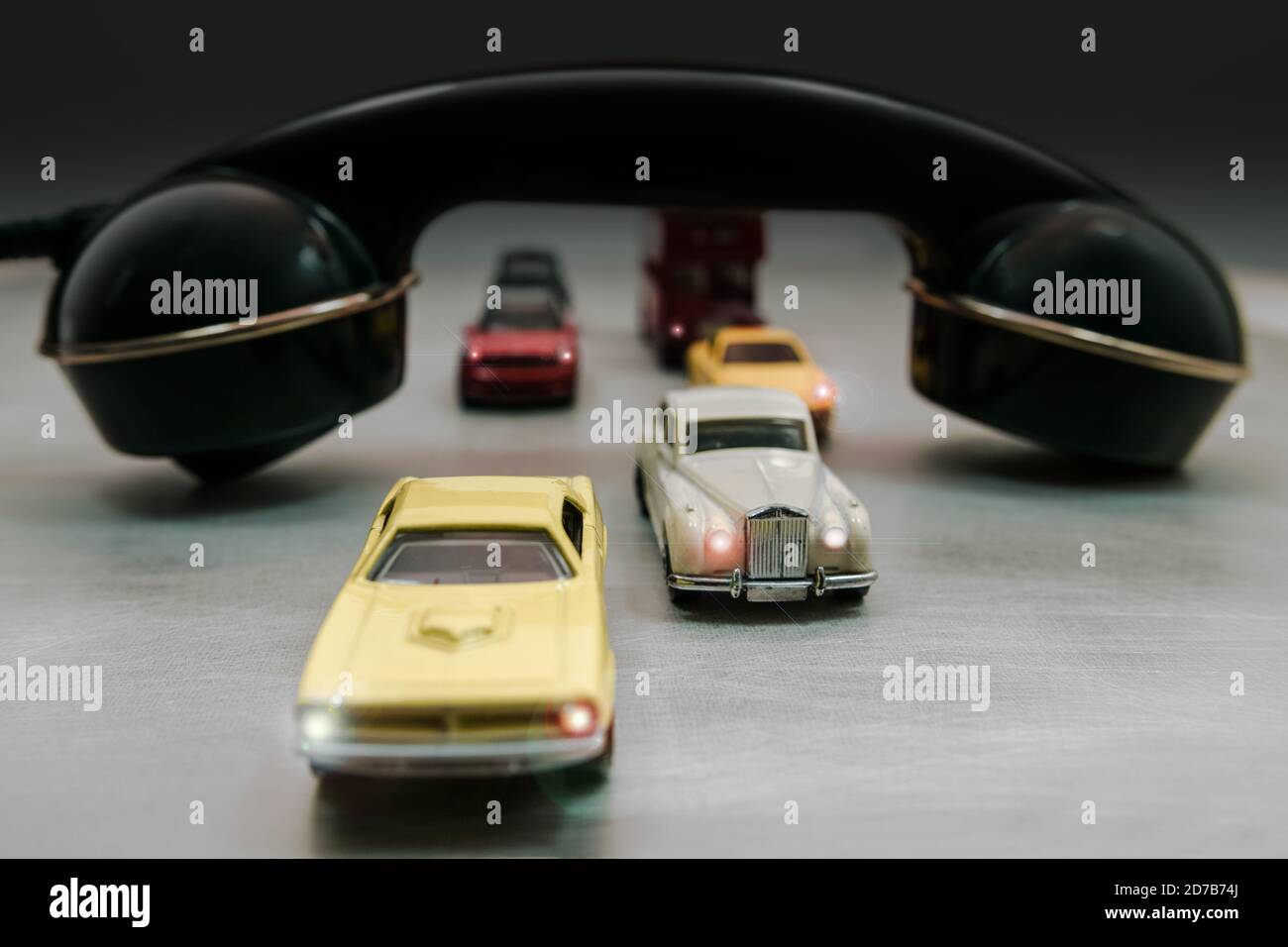 A vintage telephone receiver which takes the form of a bridge below ...