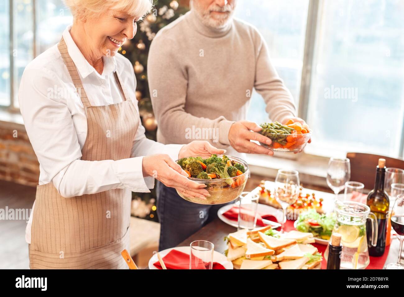 Happy people with healthy eating food in hands Stock Photo - Alamy