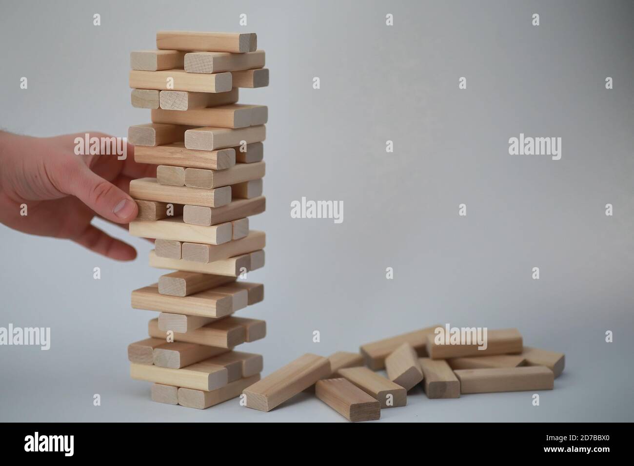 Board game jenga tower of wood sticks Stock Photo - Alamy