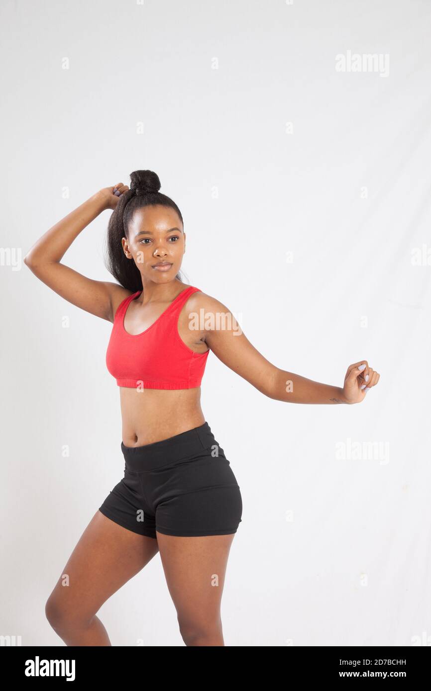 Lovely Black woman dancing for joy Stock Photo - Alamy