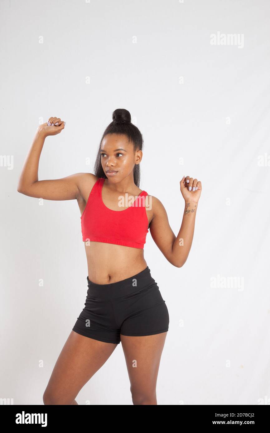 Lovely Black woman dancing for joy Stock Photo - Alamy