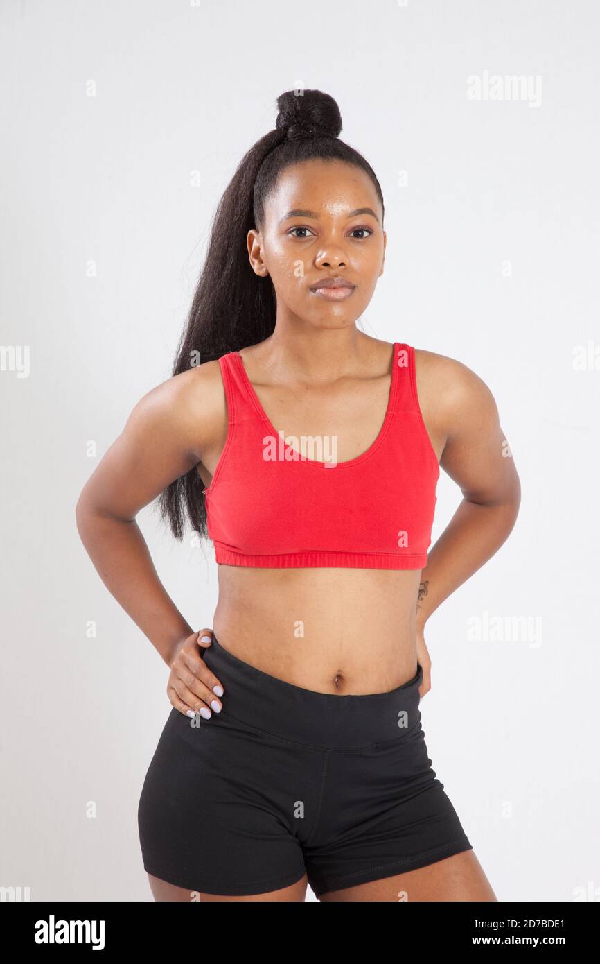 Lovely woman with her hand on her hips Stock Photo - Alamy