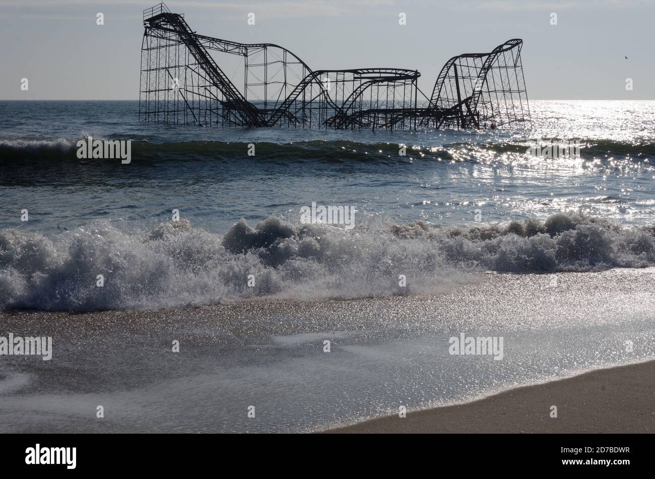 A roller coaster sits in the Atlantic Ocean after a pier collapsed ...