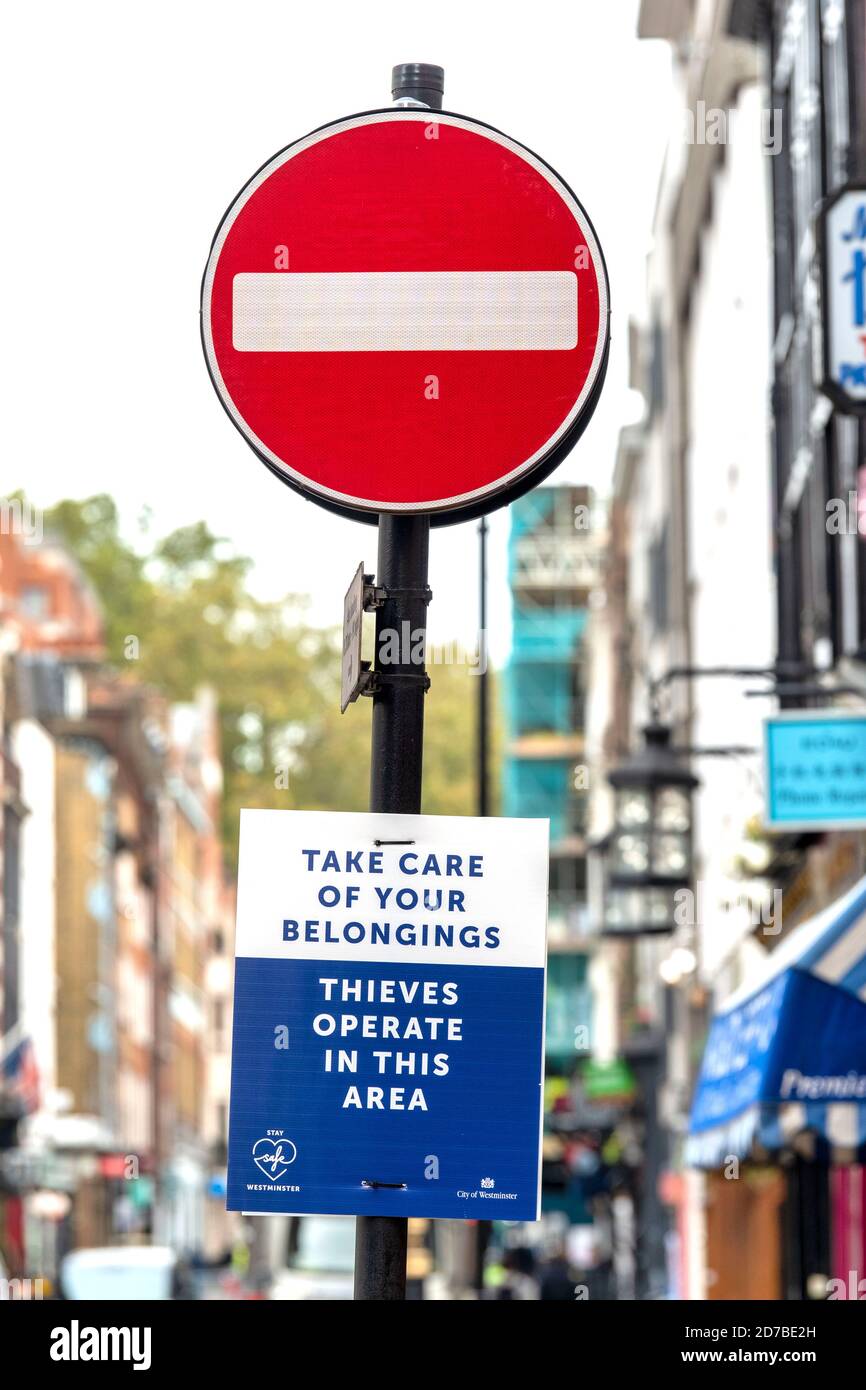 London, UK. 12th Oct, 2020. A sign in Soho, warning people to take care ...