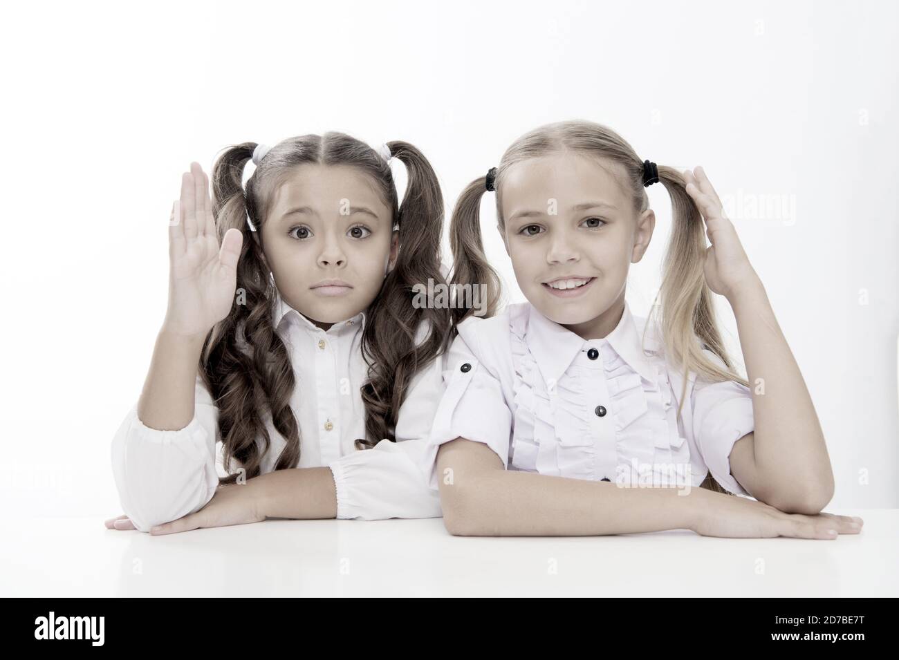 question and answer. little school girls know answer to question. i ...