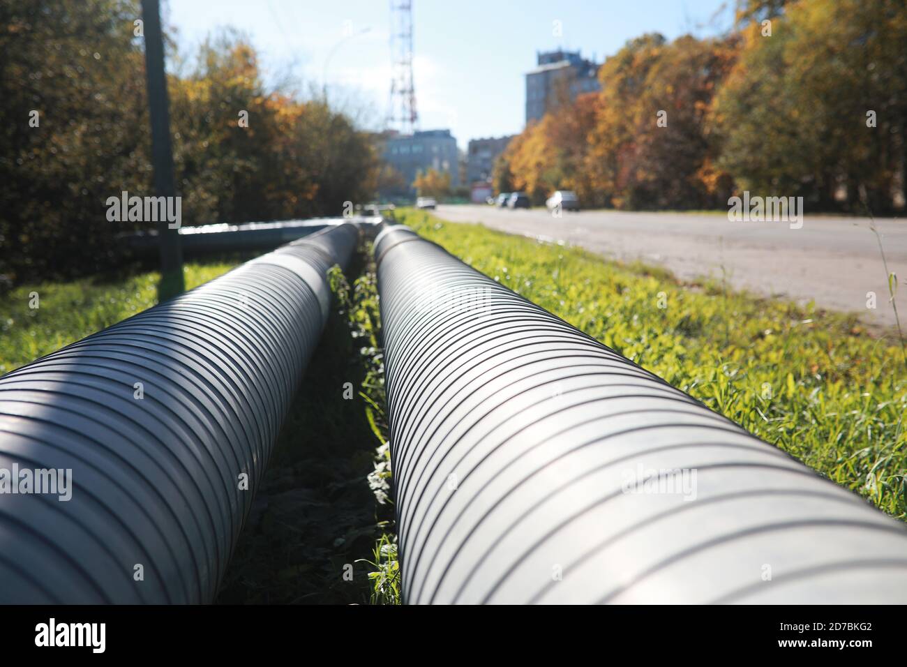 Industrial pipes on street construction Stock Photo - Alamy