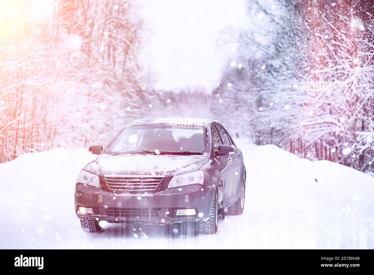 The car stands on a snow-covered road Stock Photo - Alamy