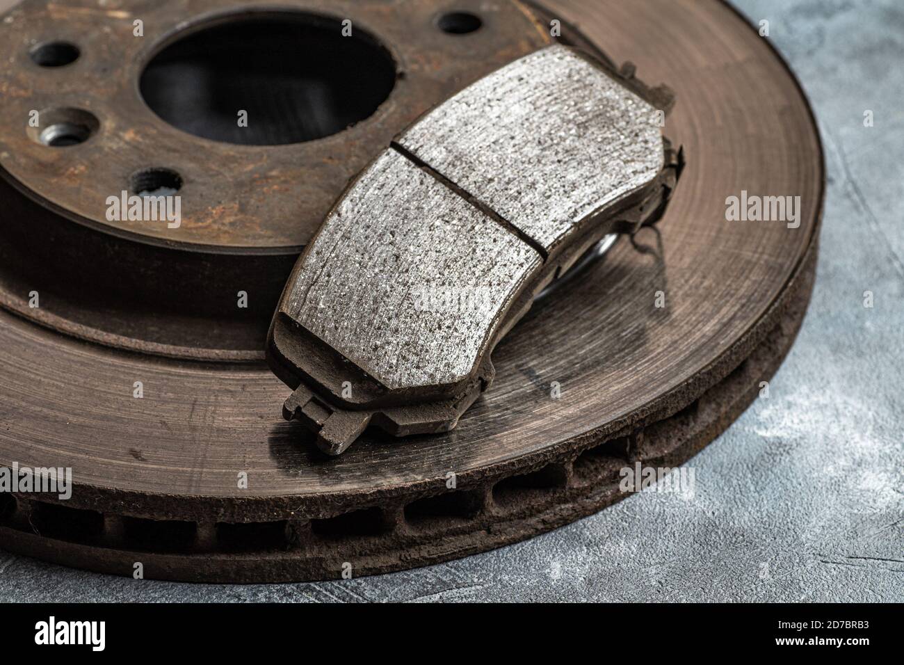 Old worn out car brake disc and brake pads, macro shot close-up Stock ...