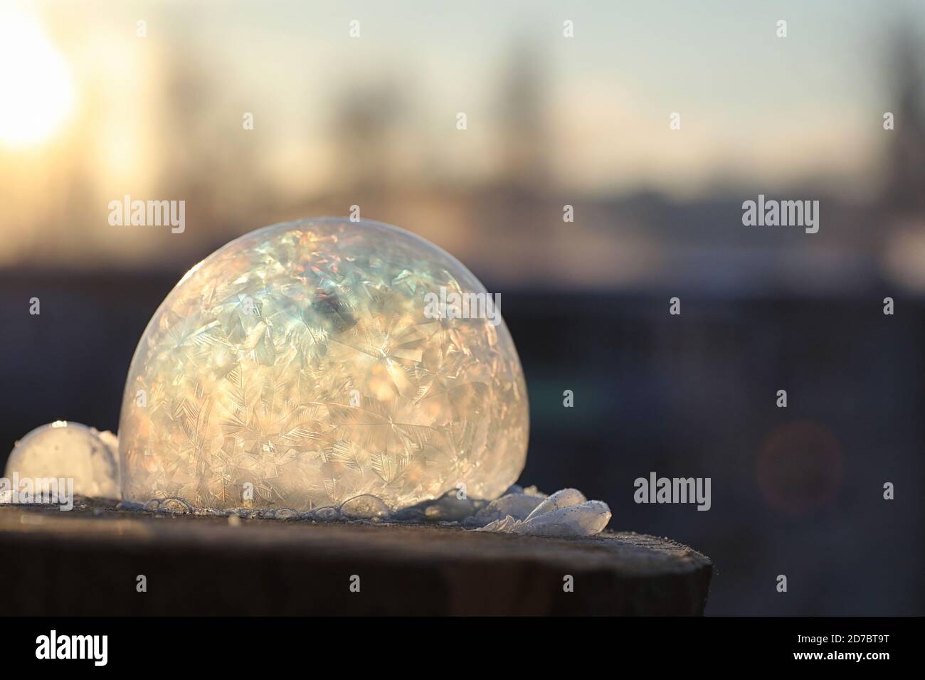 Soap bubbles freeze in the cold. Winter soapy water freezes in the air ...