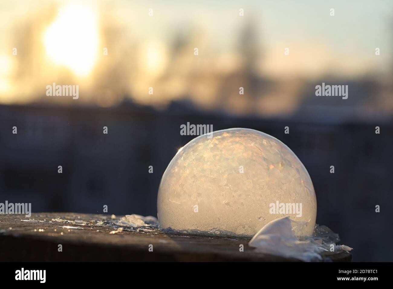 Soap bubbles freeze in the cold. Winter soapy water freezes in the air ...