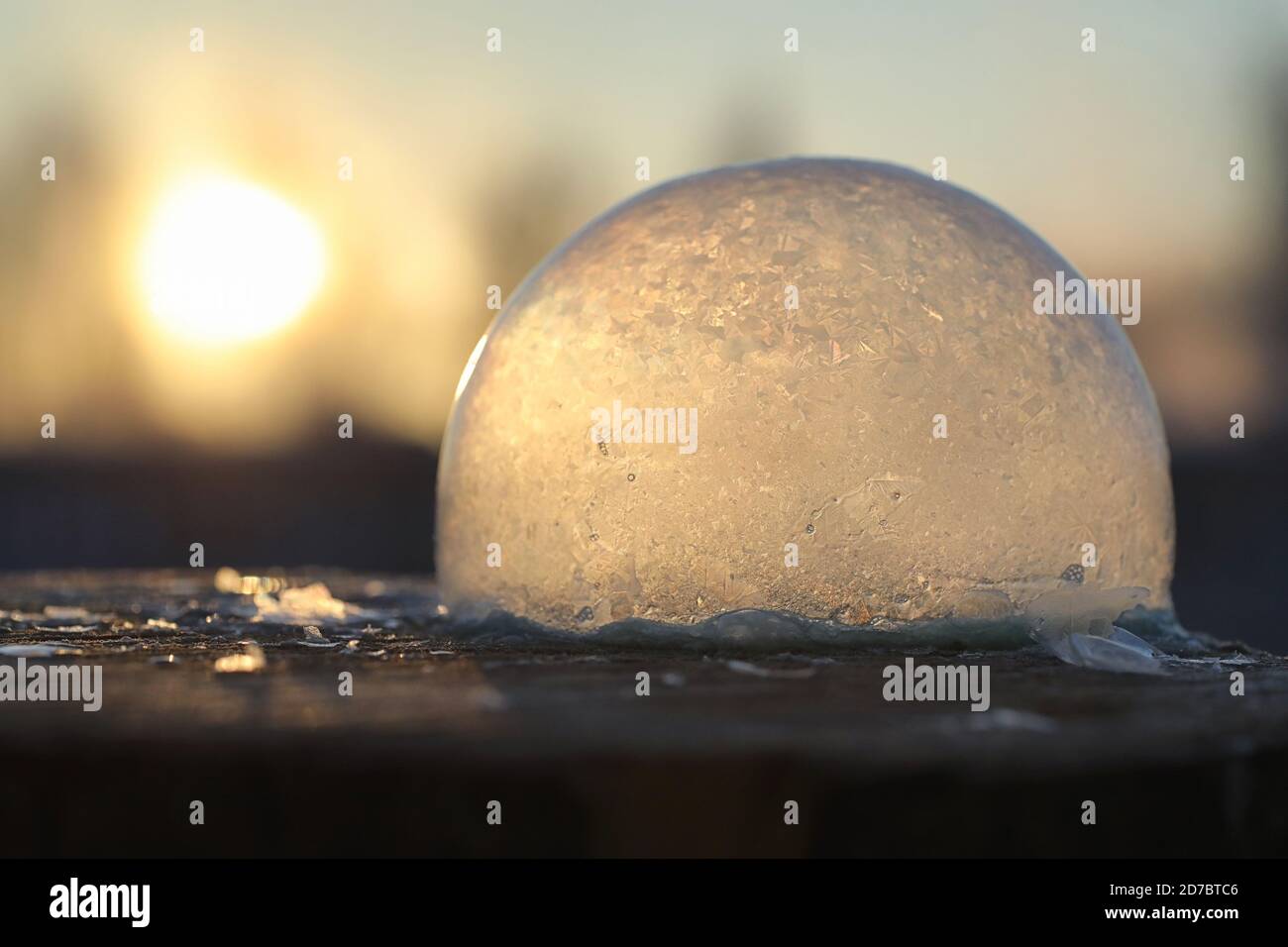 Soap bubbles freeze in the cold. Winter soapy water freezes in the air ...