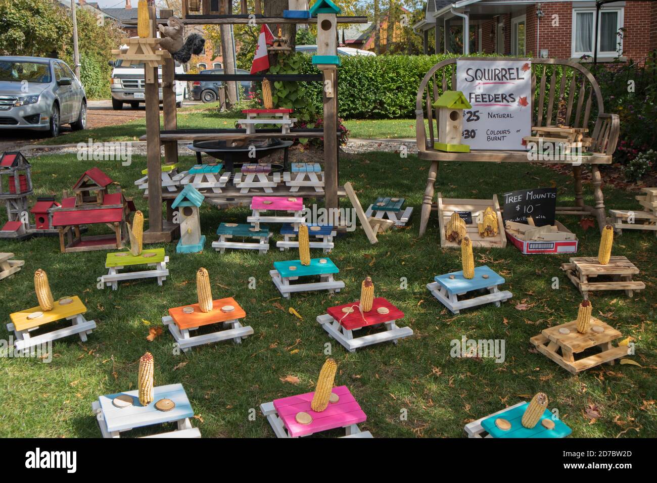 Cute, multicolored little picnic tables for the squirrels ... each ...
