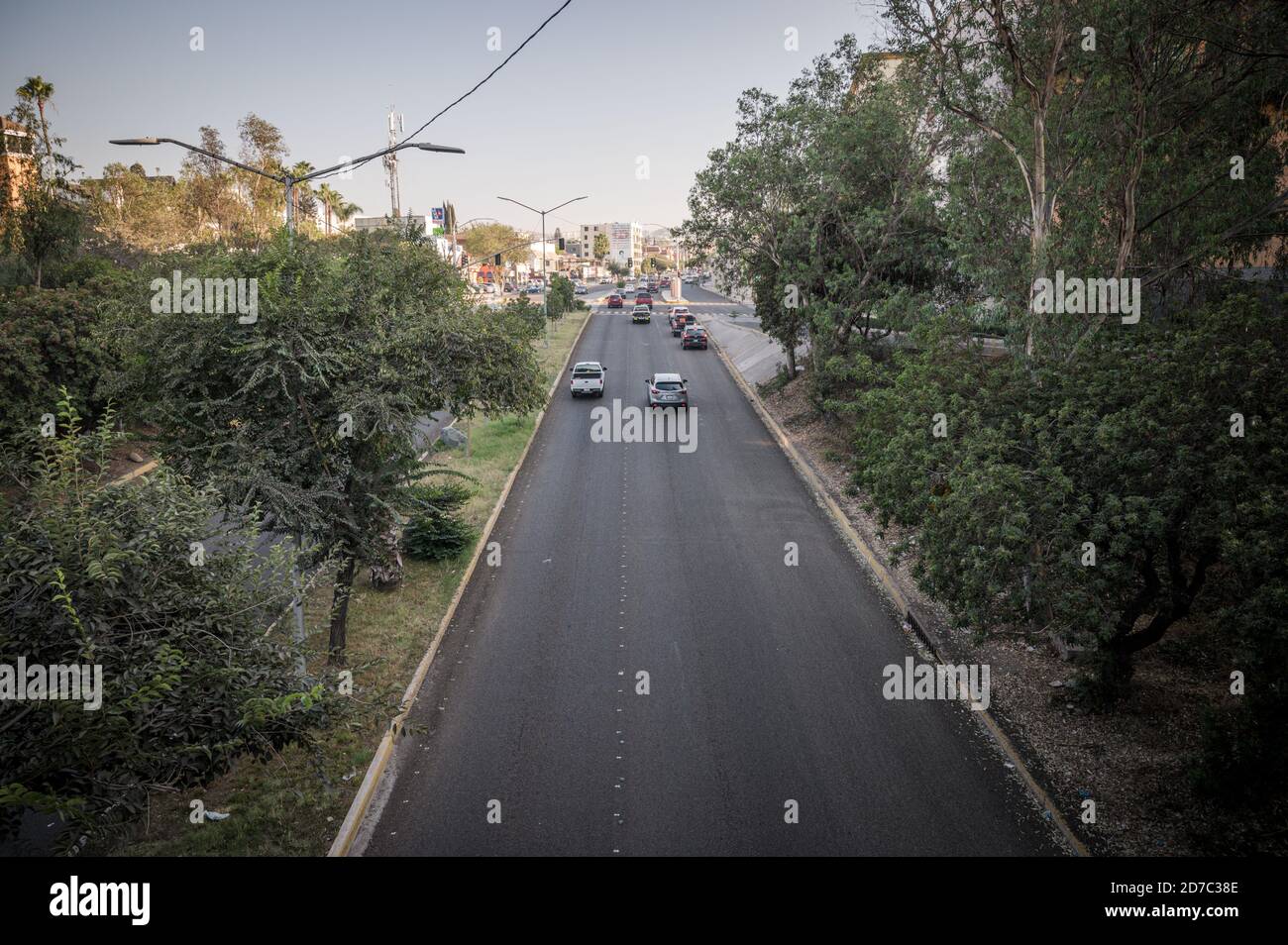 Cars driving on street in Tijuana Mexico Stock Photo - Alamy