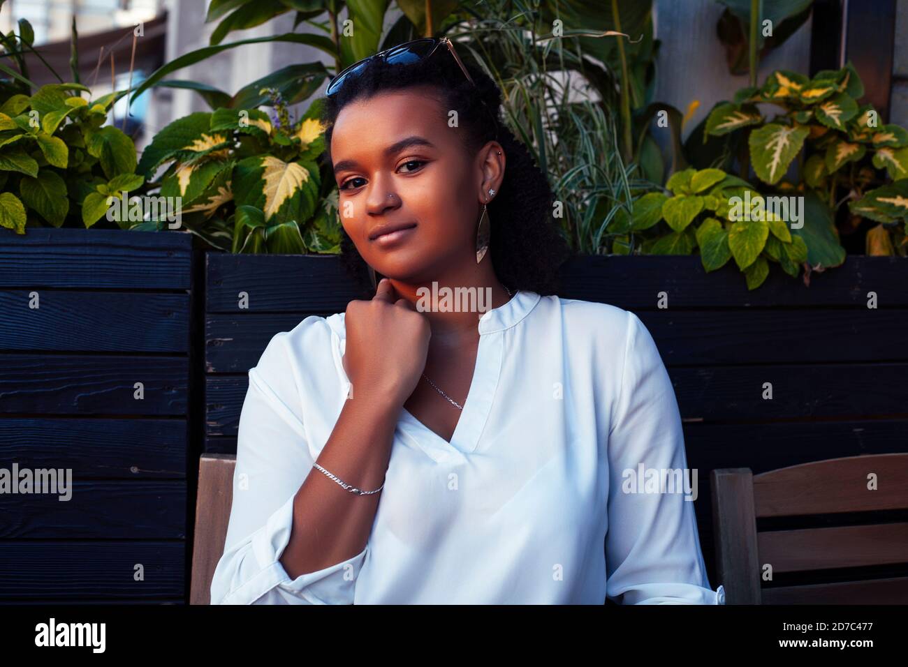 Young Pretty African Girl Posing Cheerful In Cafe Outdoor Lifestyle