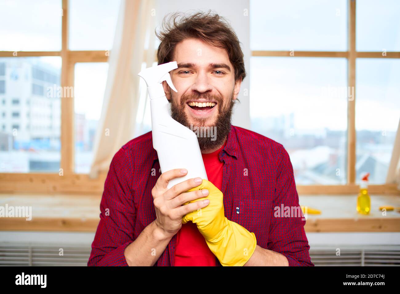 Cheerful man cleaning detergent homework hygiene interior Stock Photo ...