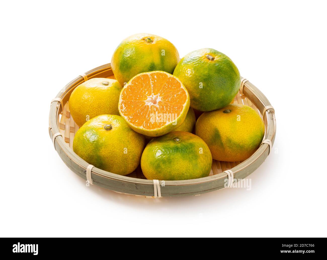 Cut Japanese early maturing mandarin oranges on a white background ...