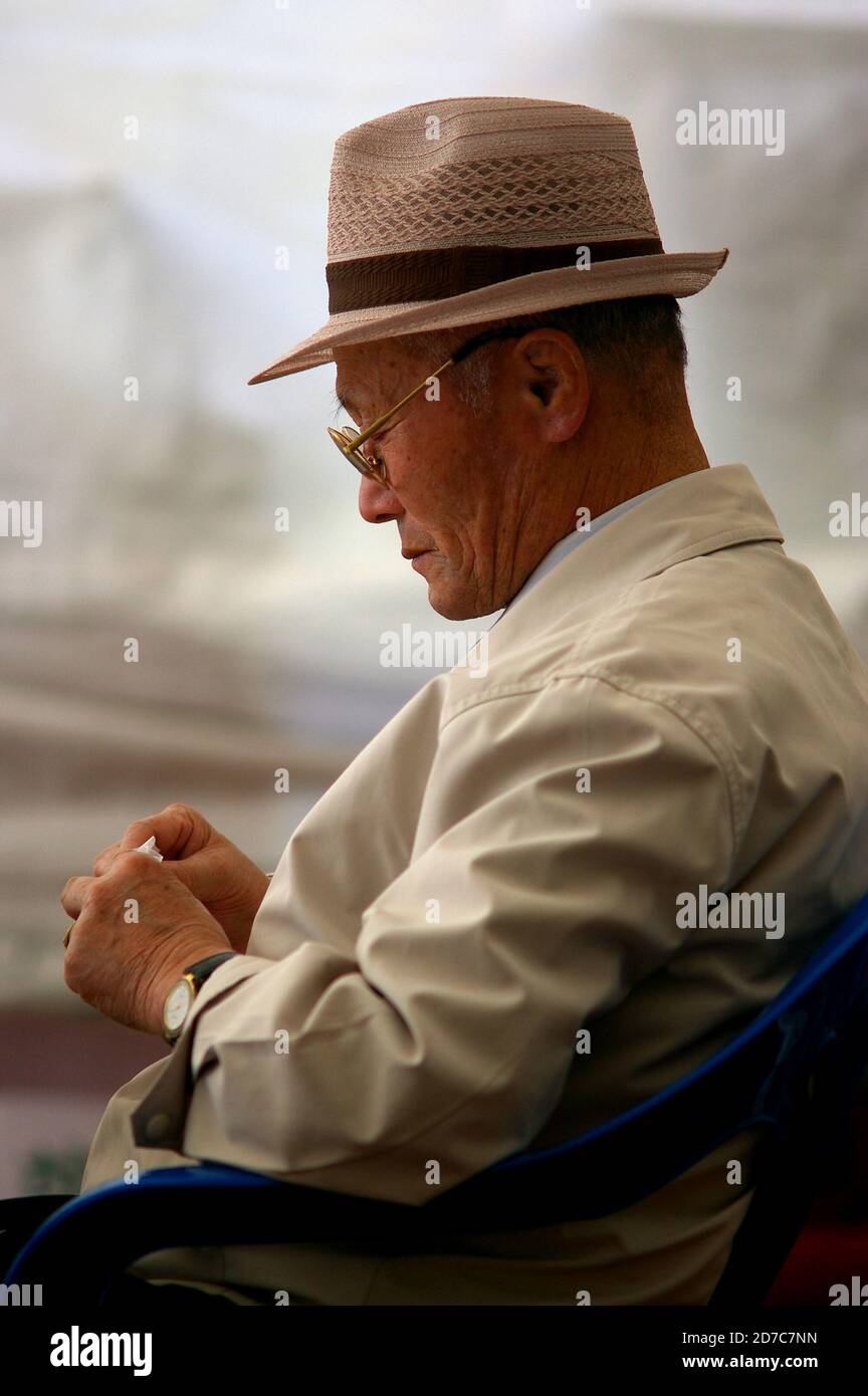 Thinking old man Stock Photo - Alamy