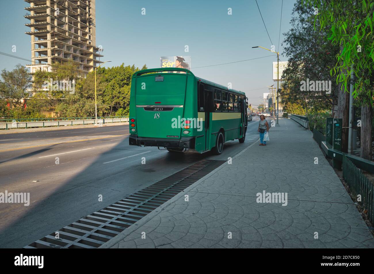 Green public transportation bus in Tijuana, Mexico Stock Photo - Alamy