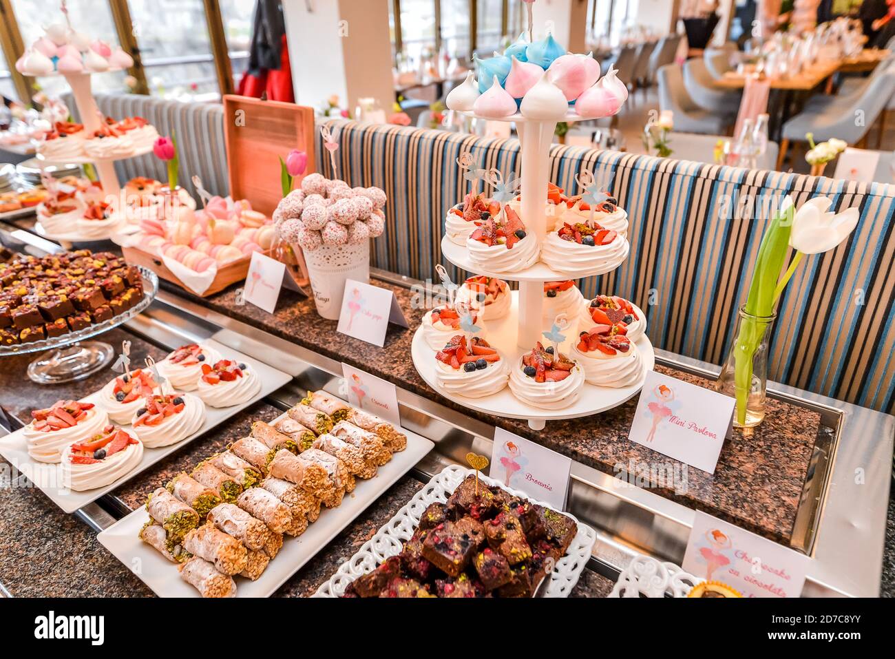 Big assortment of various desserts in the restaurant Stock Photo - Alamy