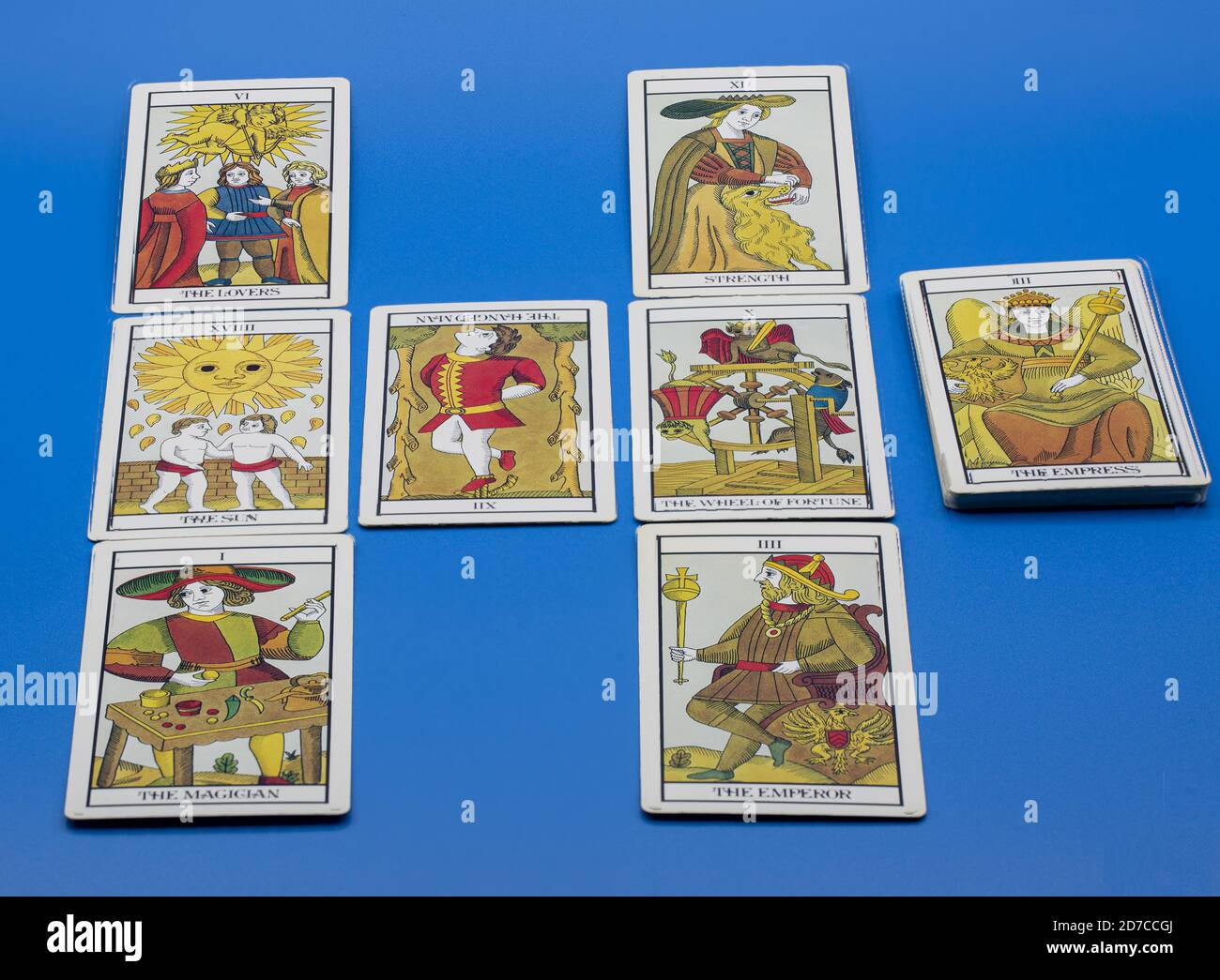 Pack of tarot cards on a blue background Stock Photo - Alamy