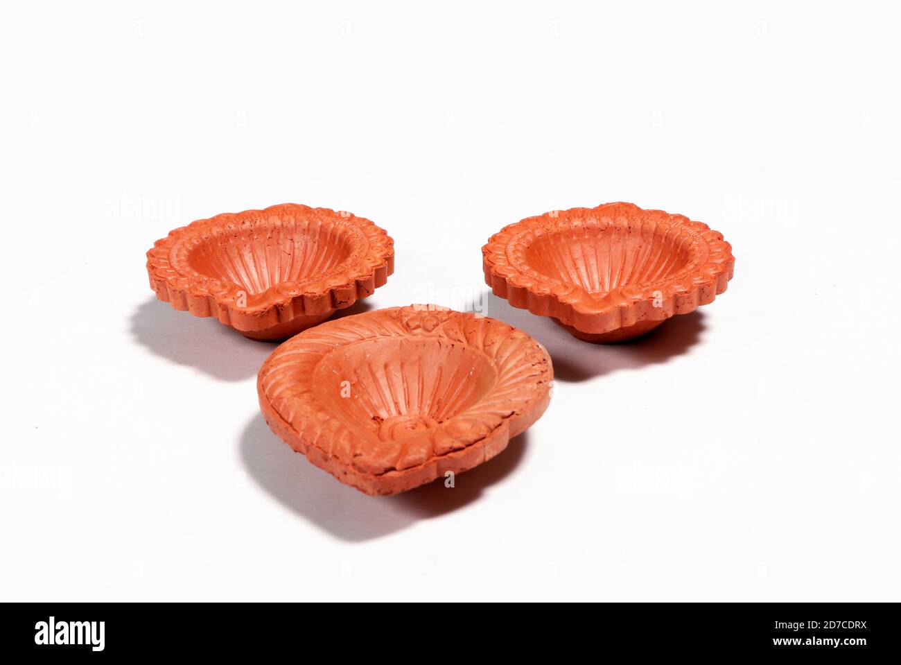 A close up of a beautifully designer handmade clay lamp isolated on ...
