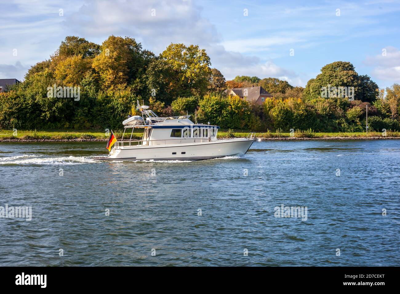 Yacht with the German flag on it floating on the water Stock Photo - Alamy