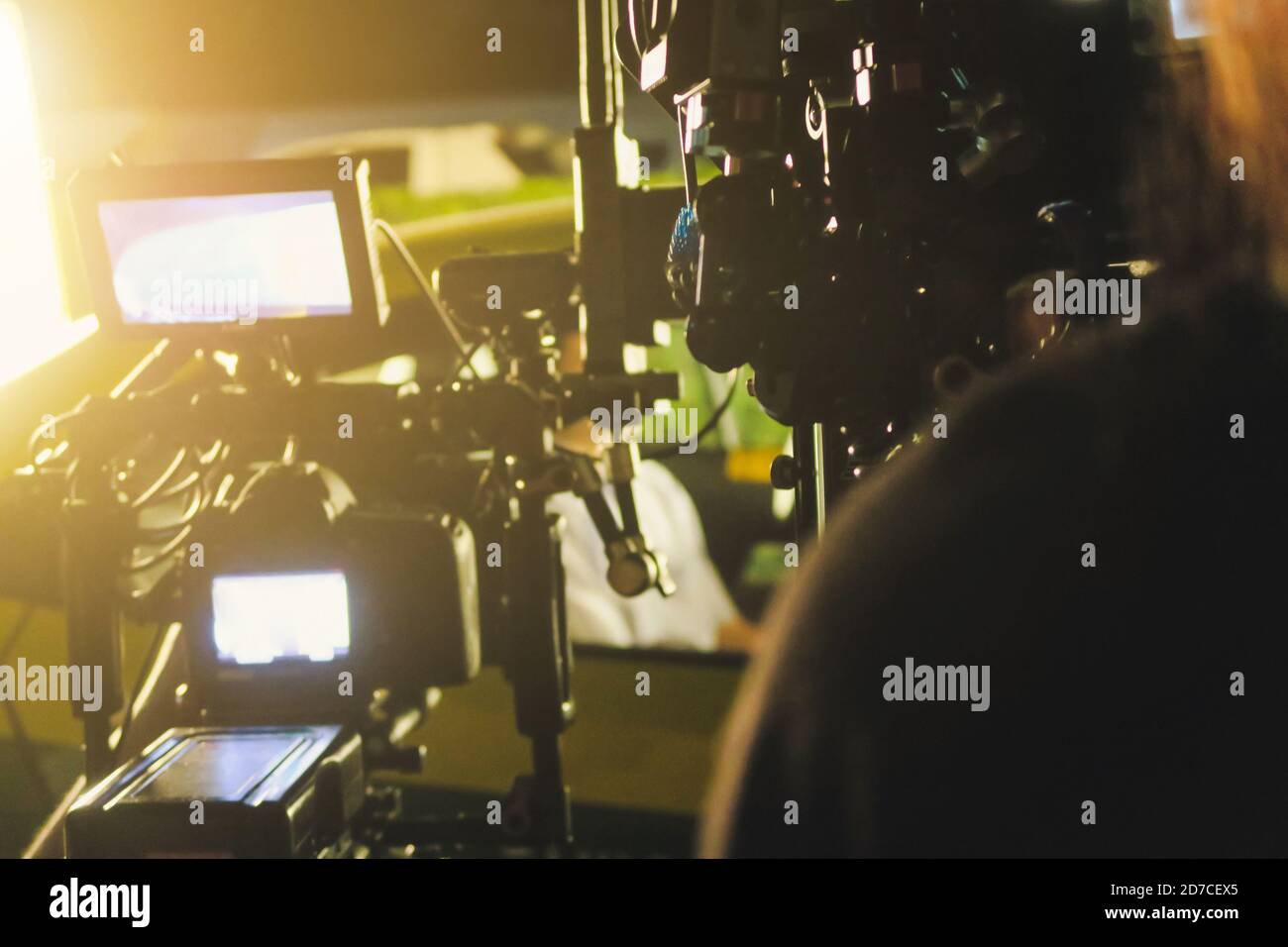 Behind the scene. cameraman shooting film scene with camera Stock Photo ...