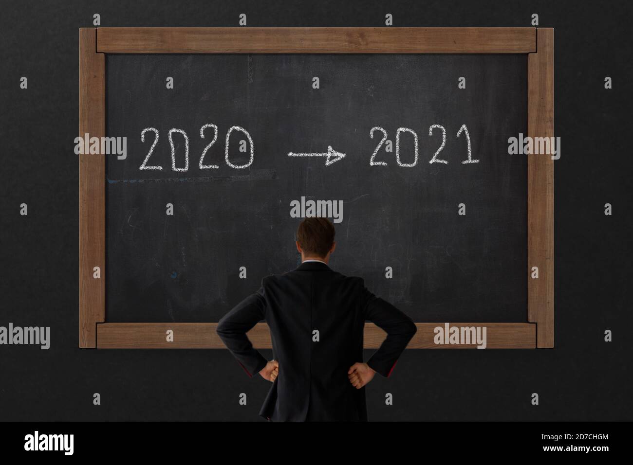 business 2021 concept, business man look on the black board that change ...
