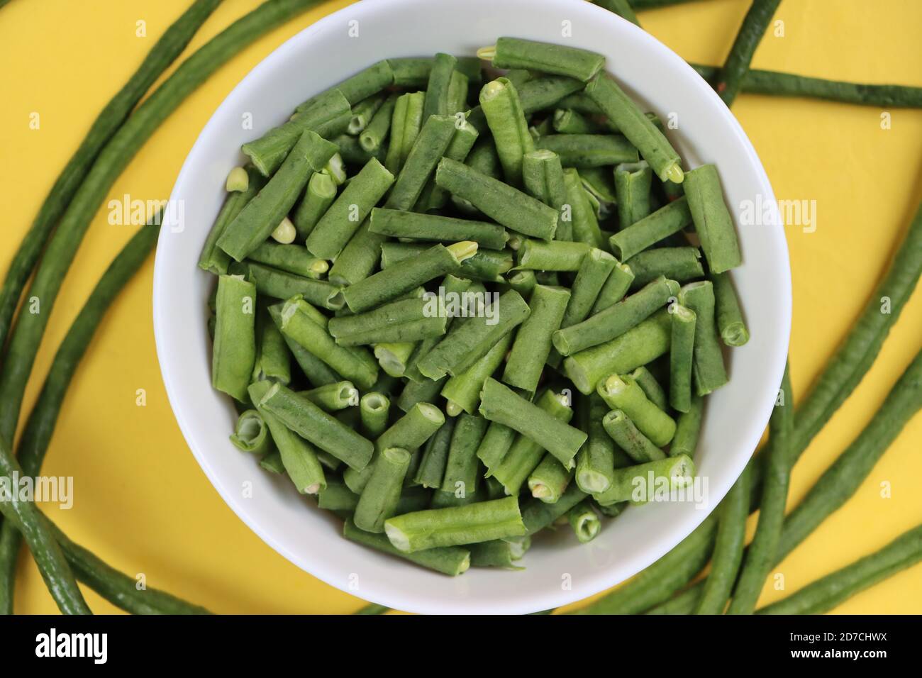 Long bean or sting bean pieces in white bowl, cooking ingredient Stock ...