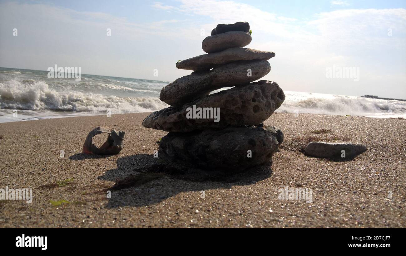 Beach stone column Stock Photo - Alamy