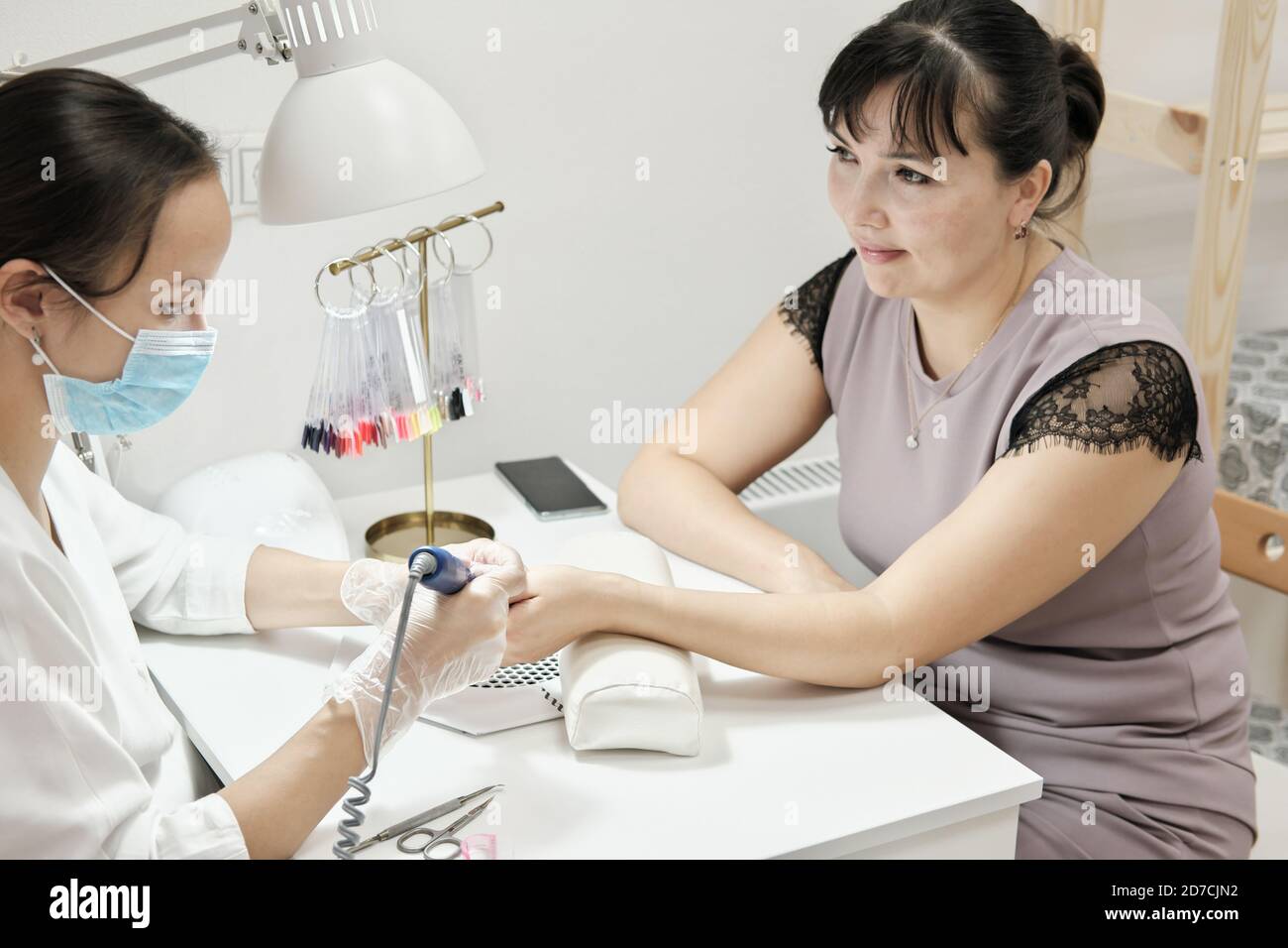 Asian manicurist nail salon hi-res stock photography and images - Alamy