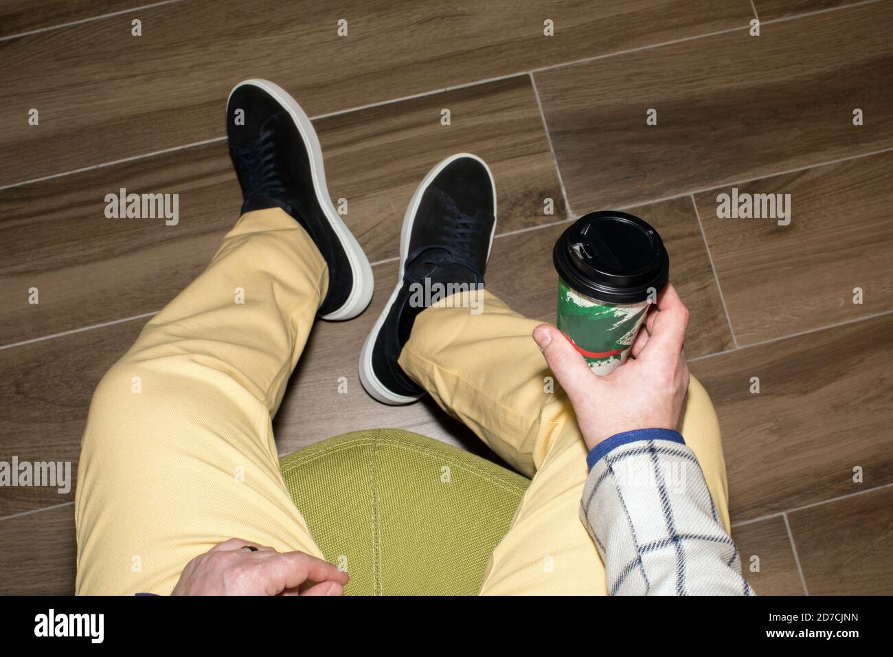 Crop man with takeaway coffee in cafe Stock Photo - Alamy