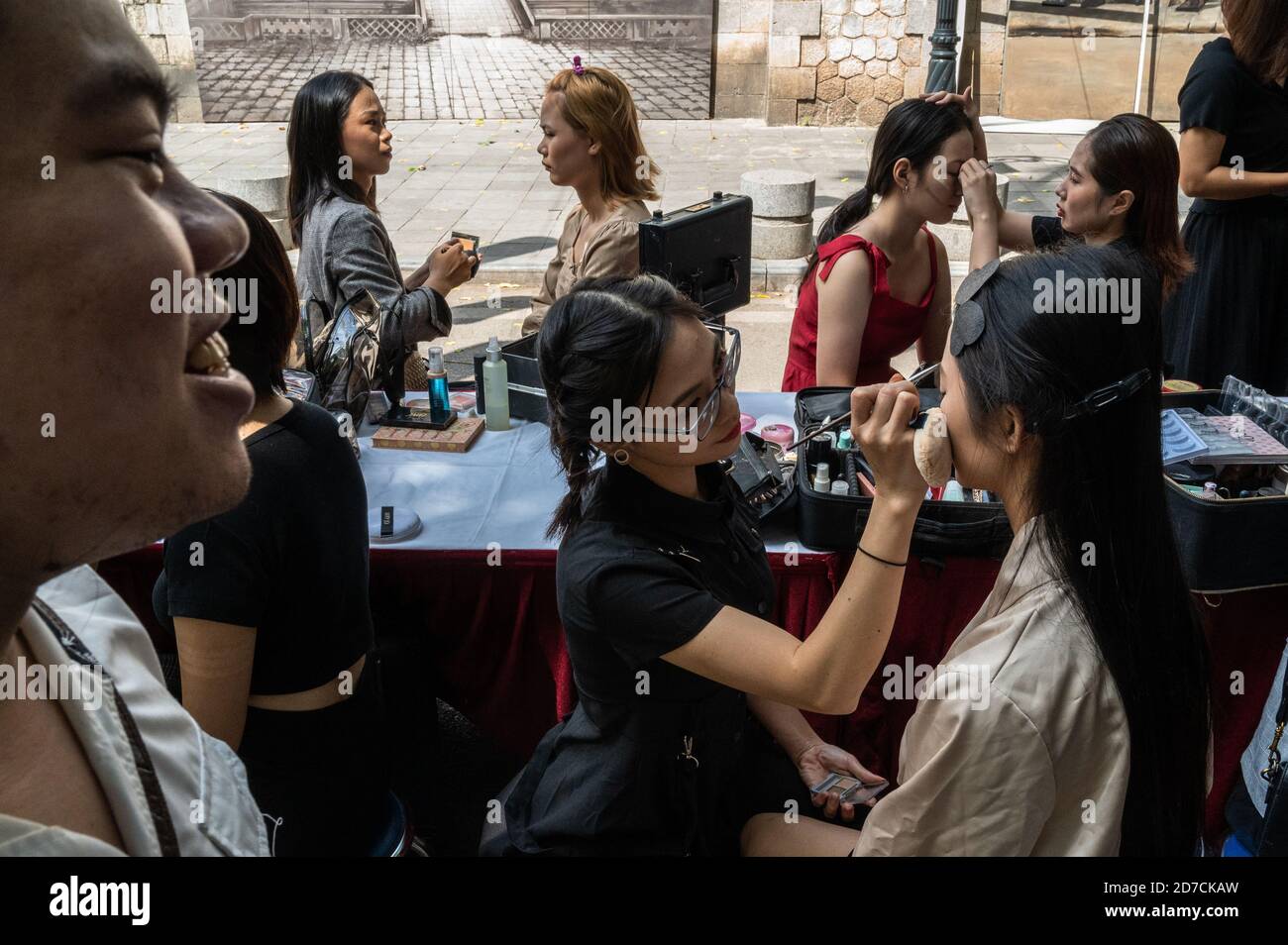 Young women getting made up for a modeling event, Pho Bich Hoa Phung ...