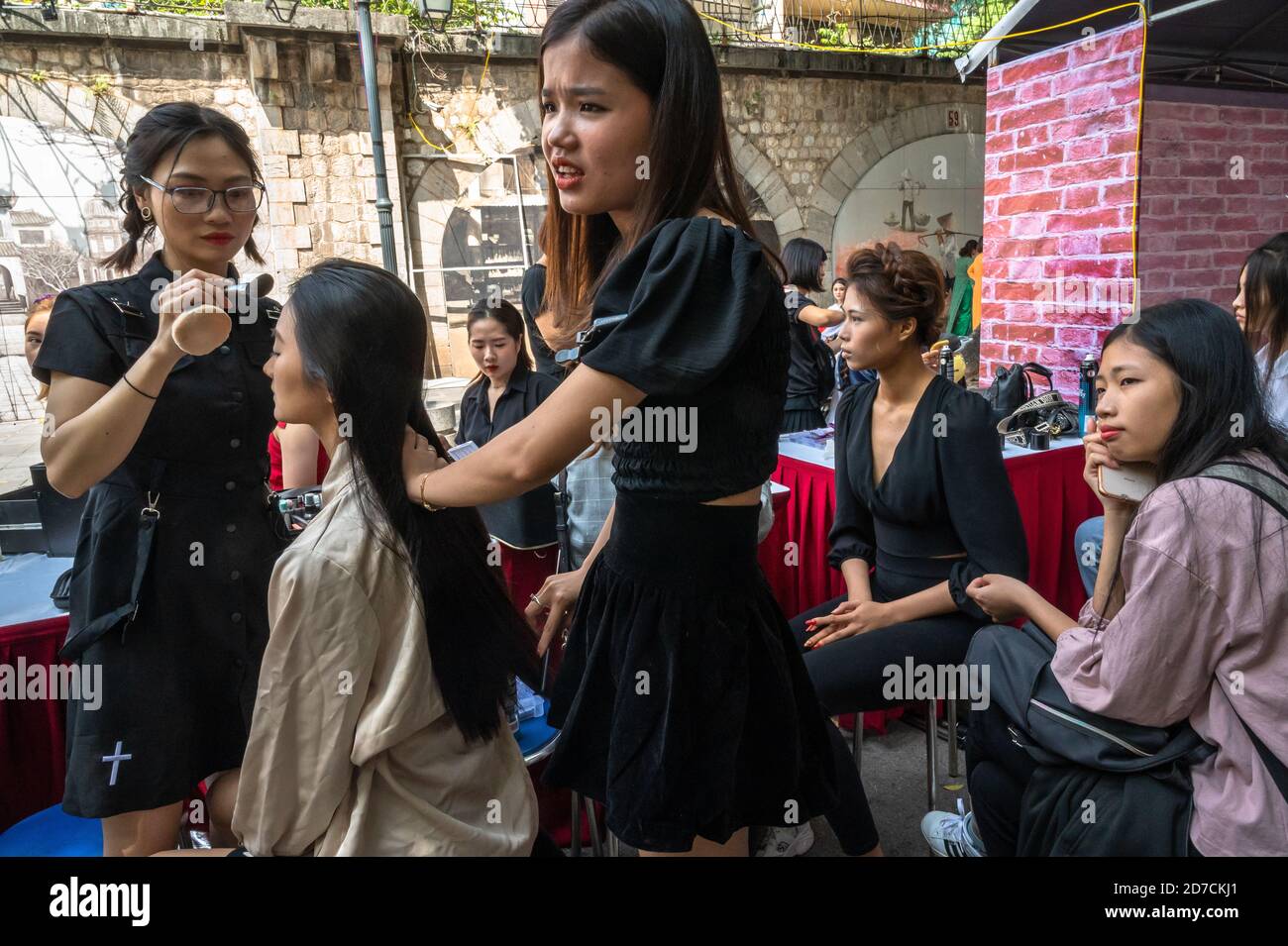 Young women getting made up for a modeling event, Pho Bich Hoa Phung ...