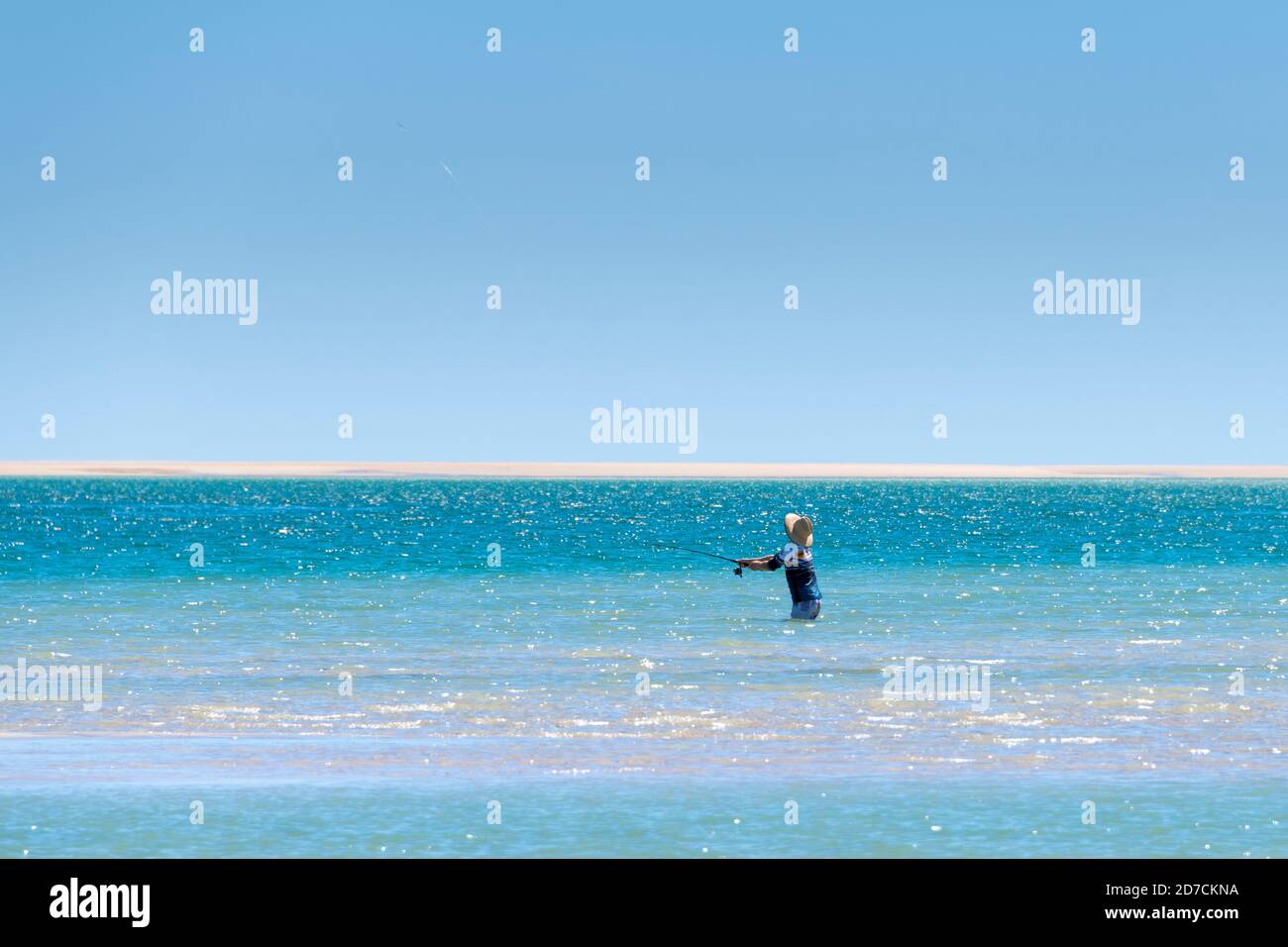 Fisherman in the lagoon at Port Smith Stock Photo - Alamy